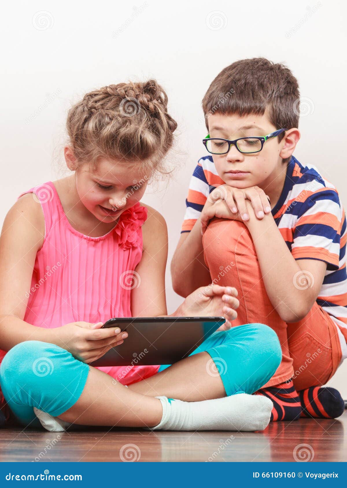 Kids playing on tablet. stock photo. Image of communication - 66109160