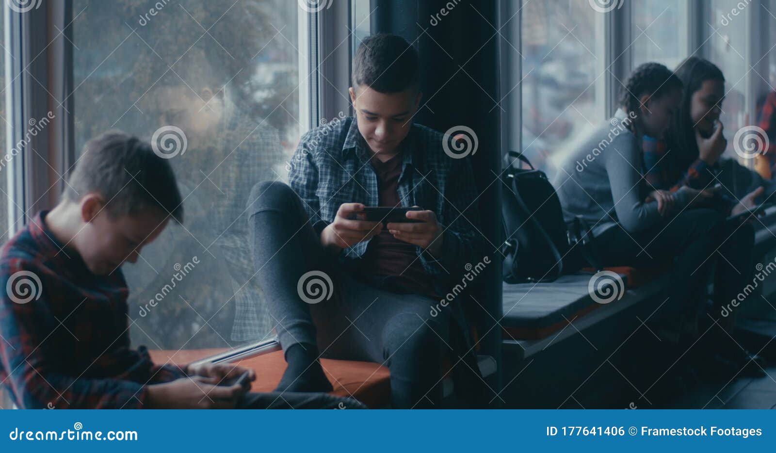 Kids Playing on Their Smartphone in School Stock Footage - Video of ...