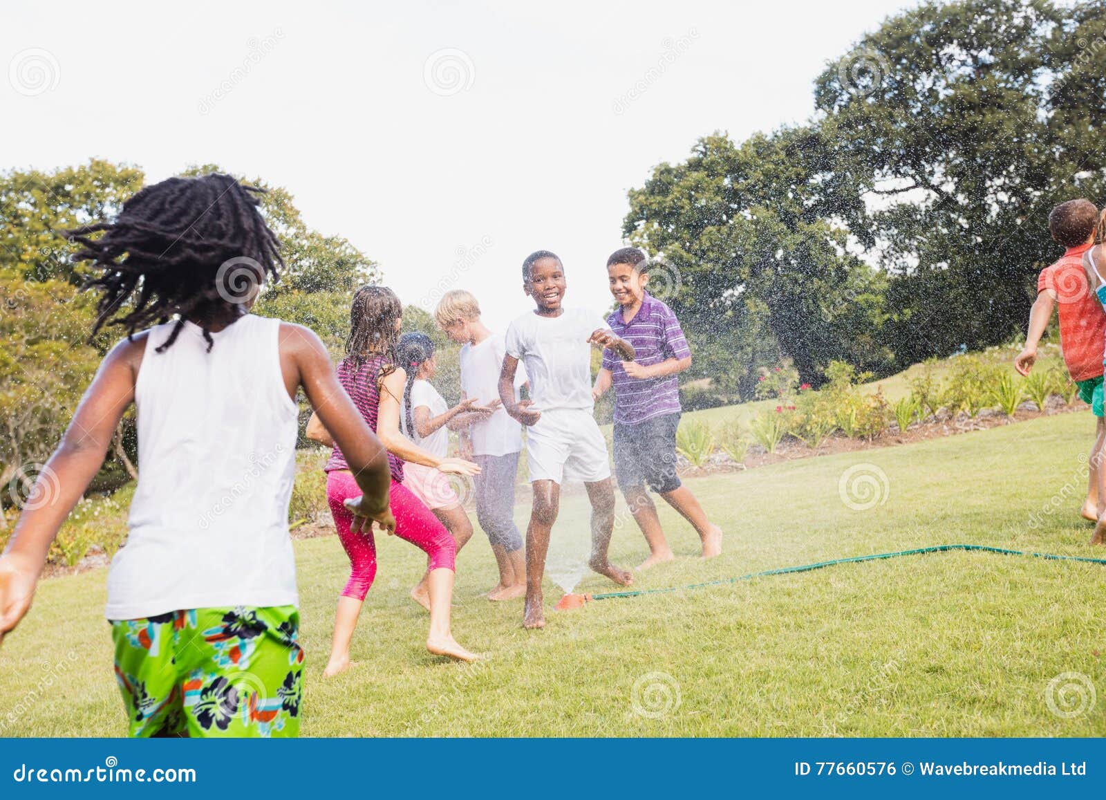 Kids Playing Together during a Sunny Day Stock Photo - Image of ...