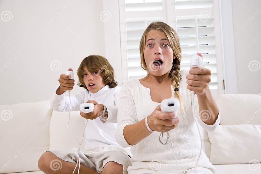 Kids playing video game stock image. Image of brother - 10594917