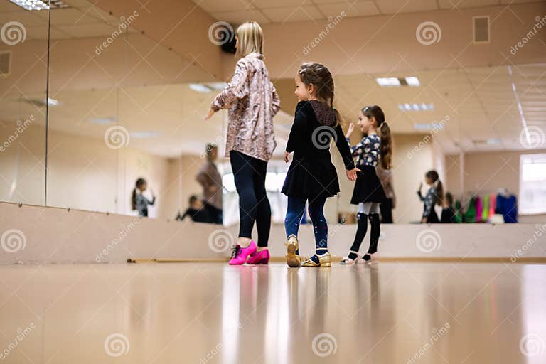 Kids Practicing Dance with Instructor in Ballet Studio Stock Photo ...