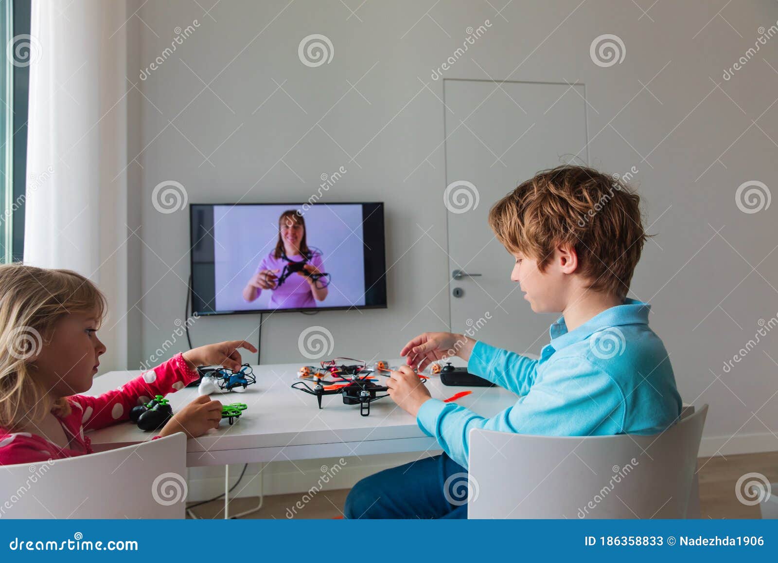 Kids programming drones stock image. Image of interior - 186358833