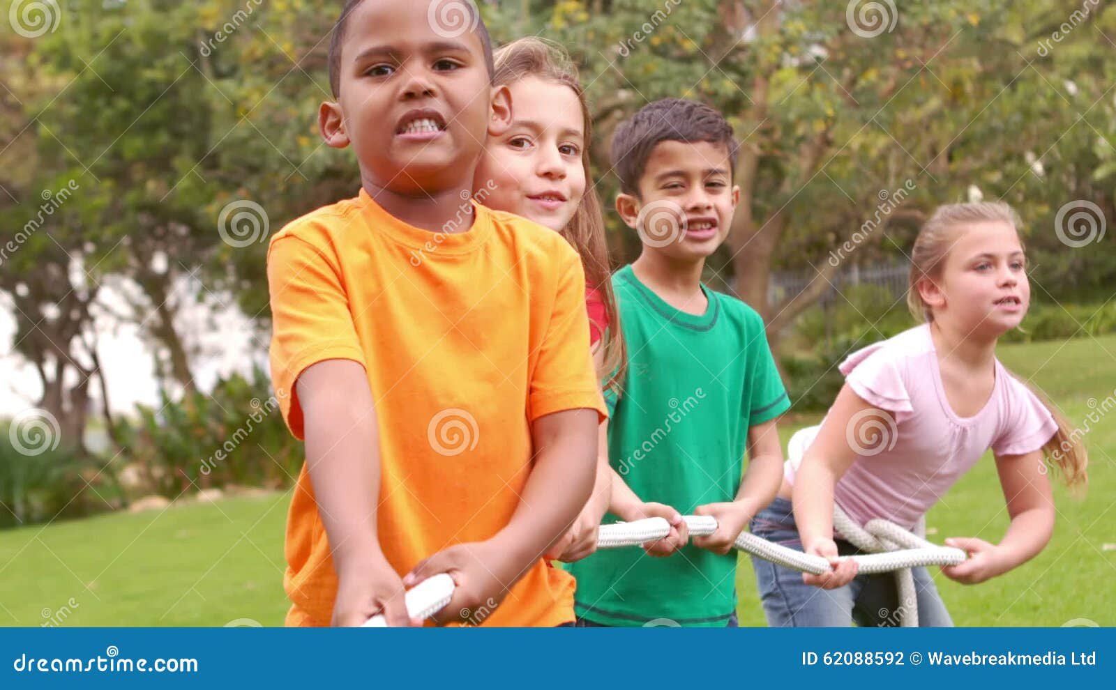 Kids pulling a large rope stock footage. Video of cheerful - 62088592