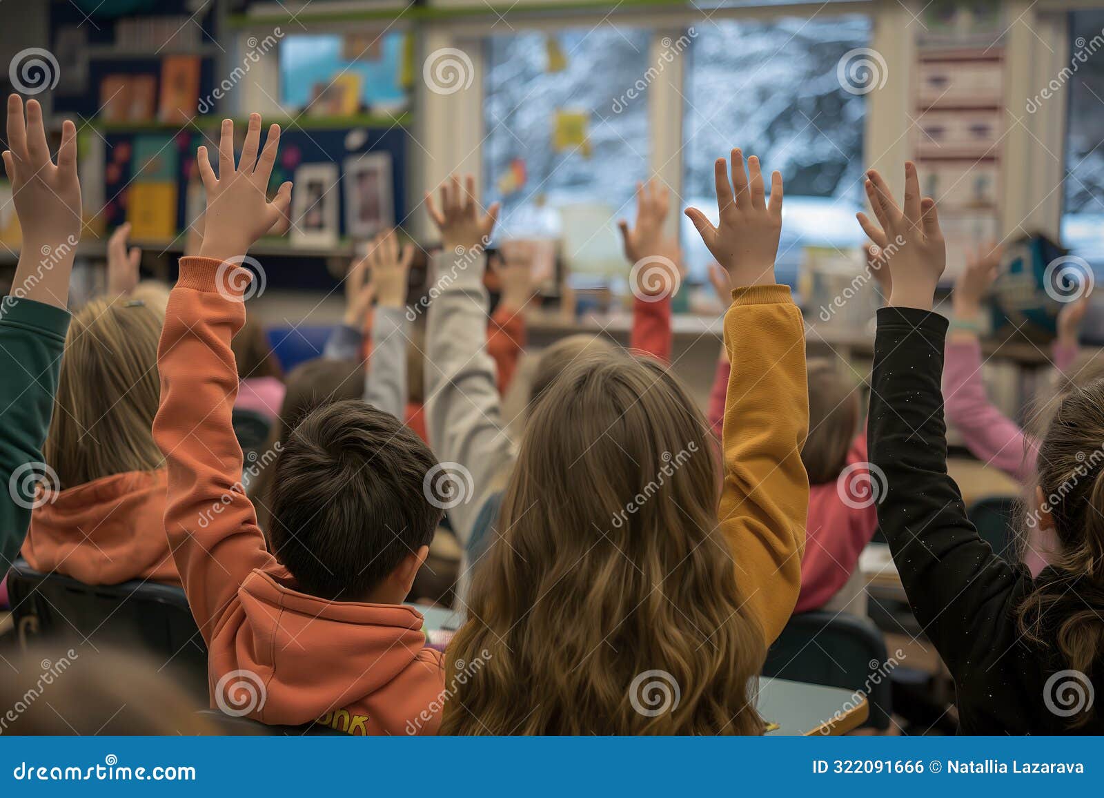 Kids Raising Hands in a Lively Classroom, View from the Back, the ...