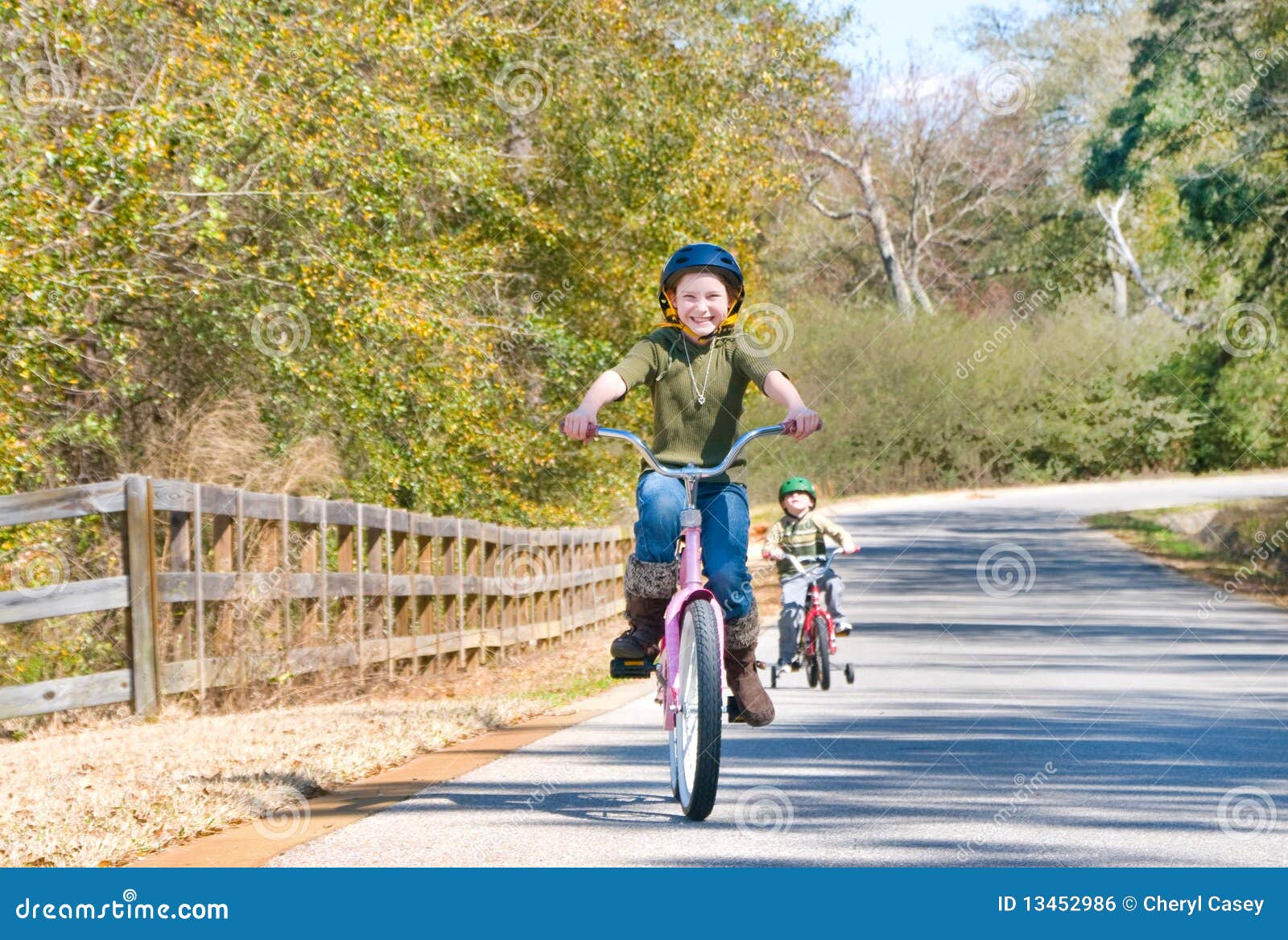 Kids riding bikes stock photo. Image of family, nature - 13452986