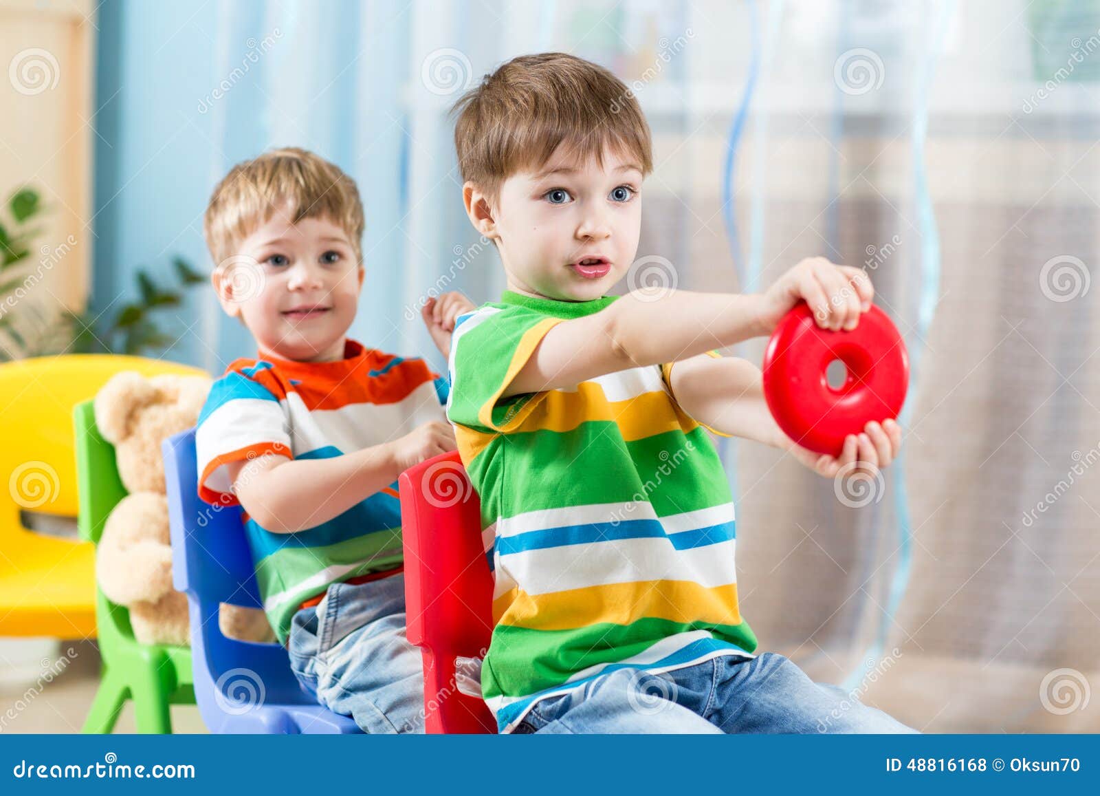 Kids Riding on Carriages Made from Chairs Stock Photo - Image of ...