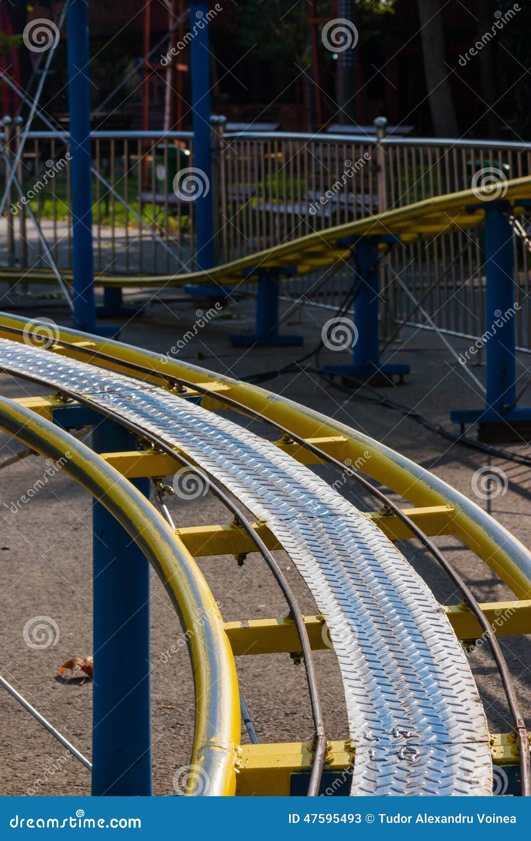 Kids Roller Coaster Yellow Rails in Amusement Park. Stock Image - Image ...