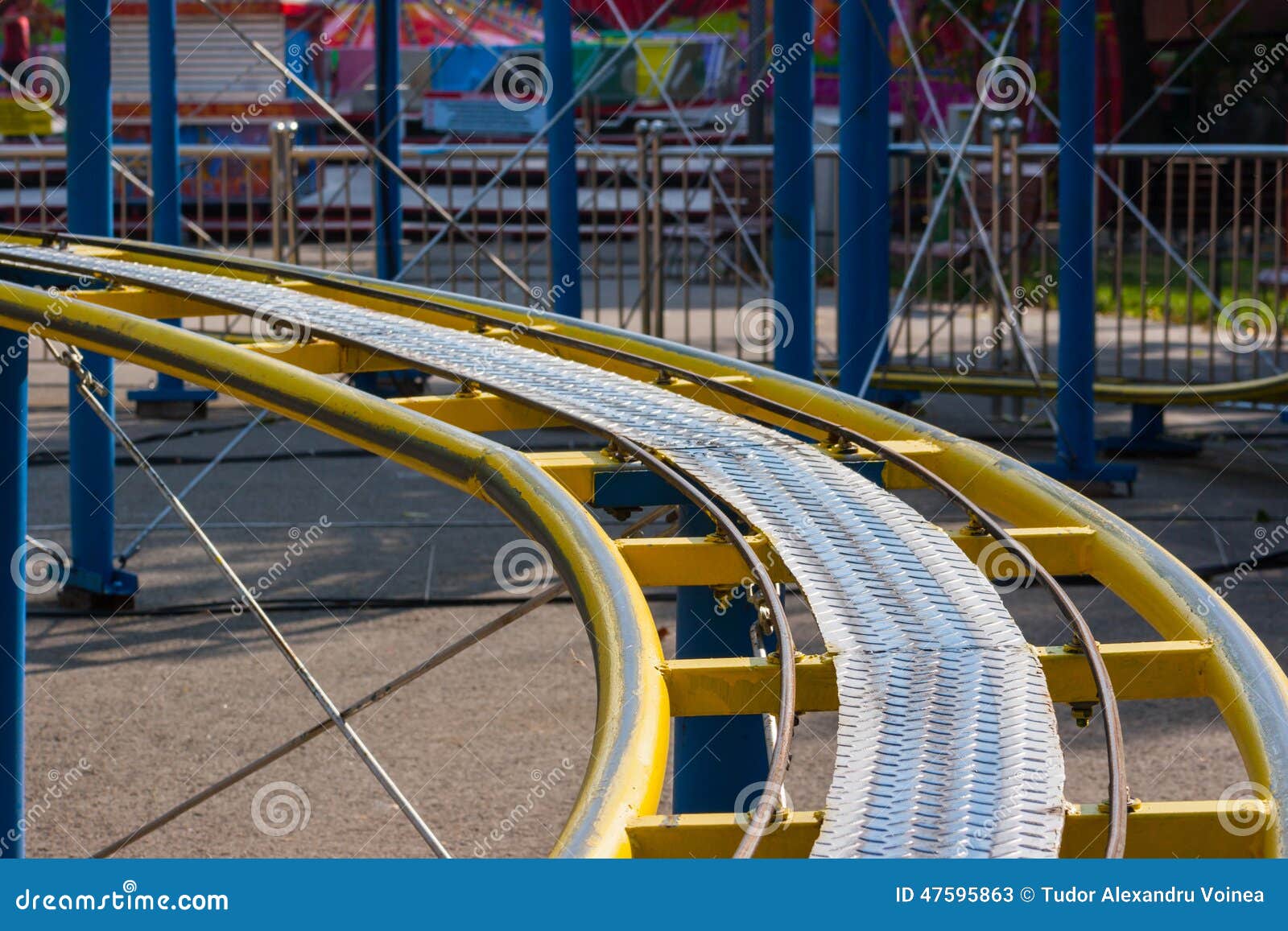 Kids Roller Coaster Yellow Rails in Amusement Park. Stock Image - Image ...