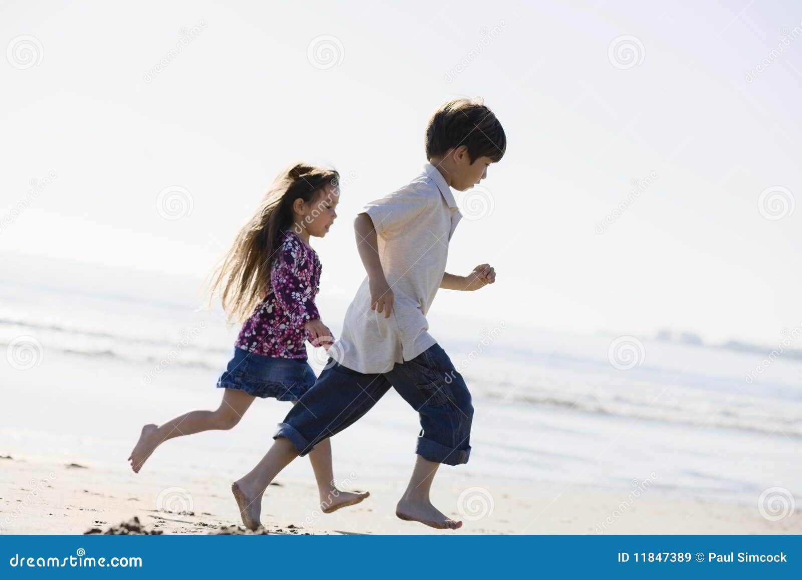 Kids Running on Beach stock image. Image of daytime, outside - 11847389