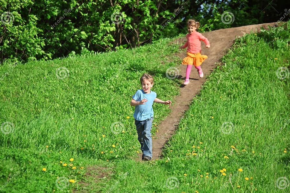 Kids running down the hill stock image. Image of lifestyle - 10969473