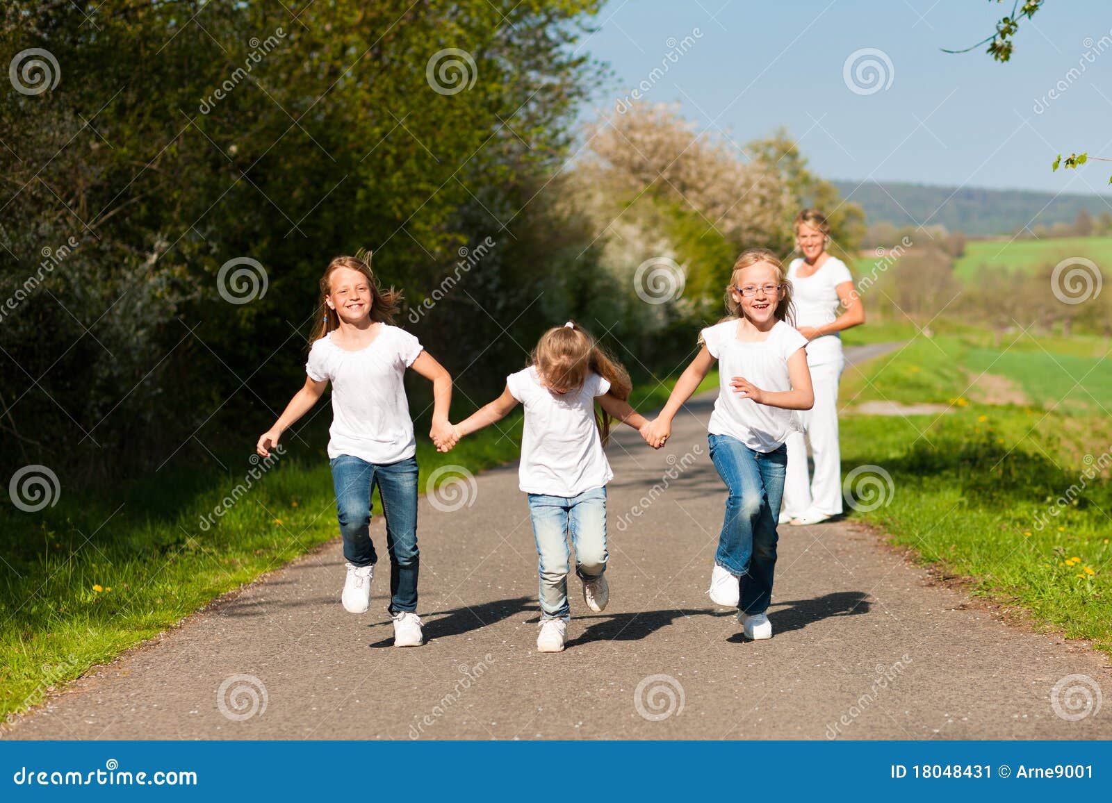 Kids Running in Spring, Mother Standing Stock Image - Image of running ...