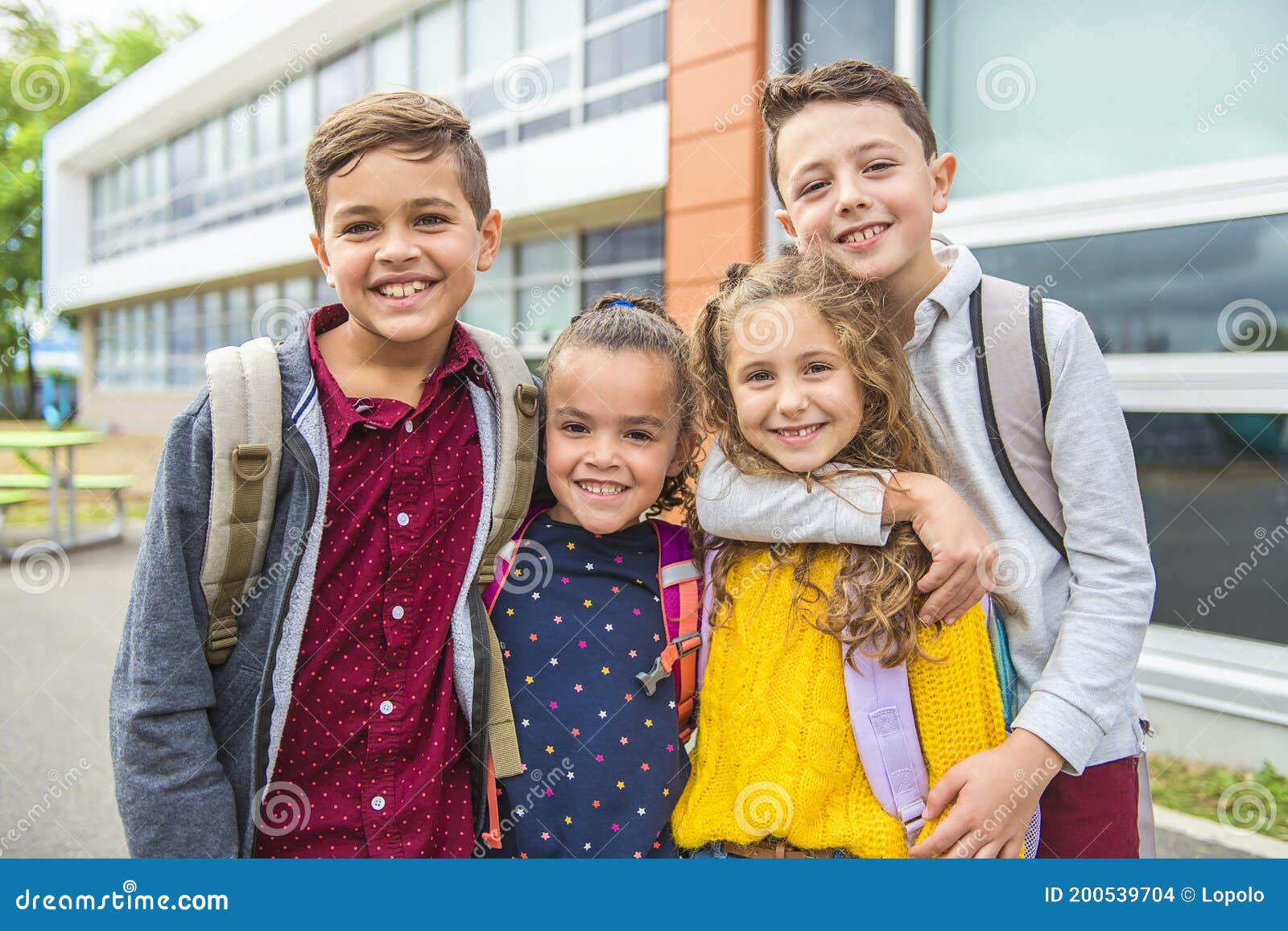Group of Kids on the School Background Having Fun Stock Photo - Image ...