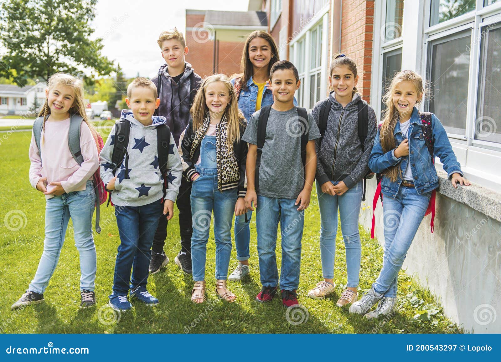 Group of Kids on the School Background Having Fun Stock Image - Image ...