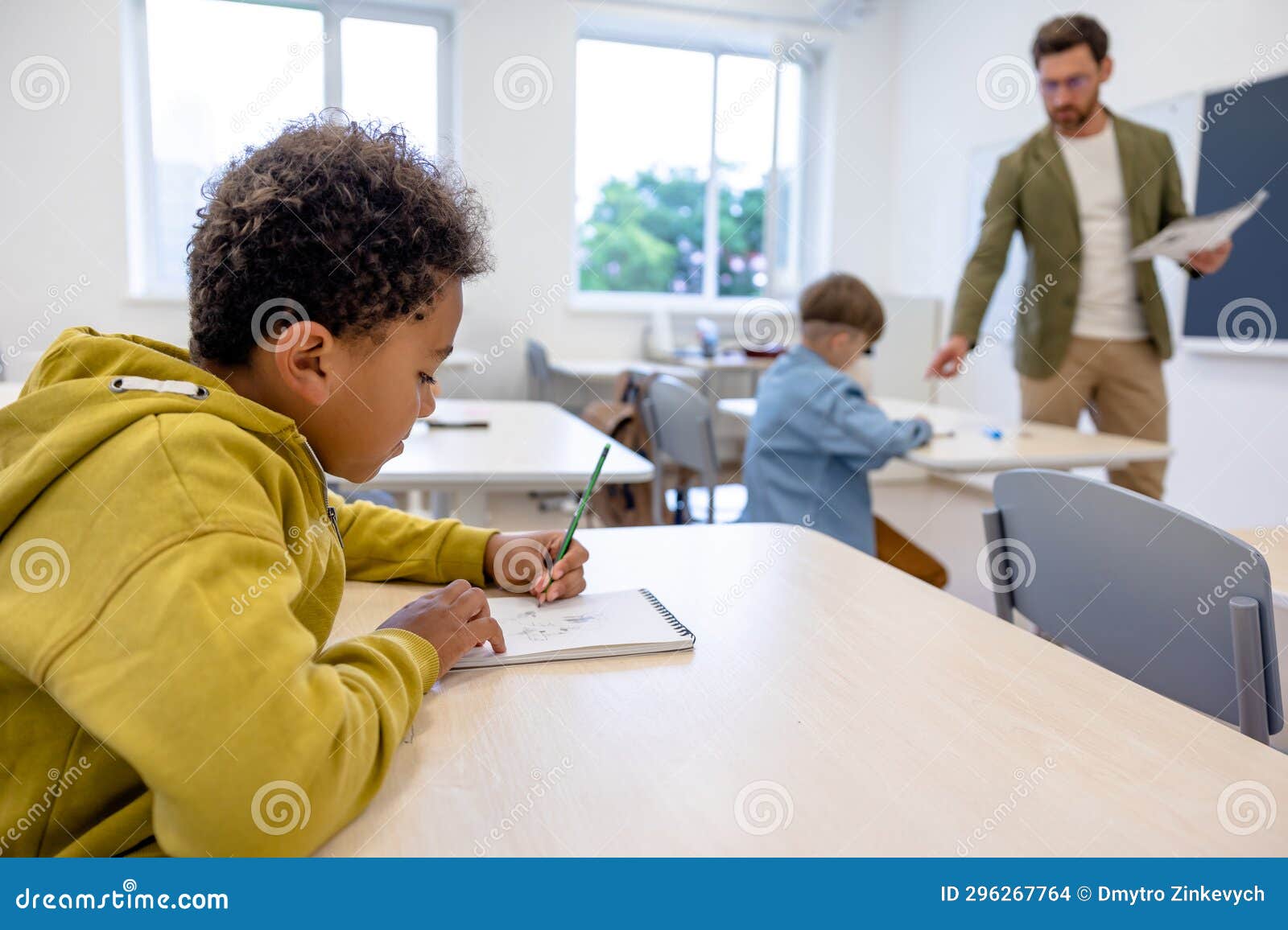 Kids at School Sitting at the Lesson and Looking Involved Stock Photo ...