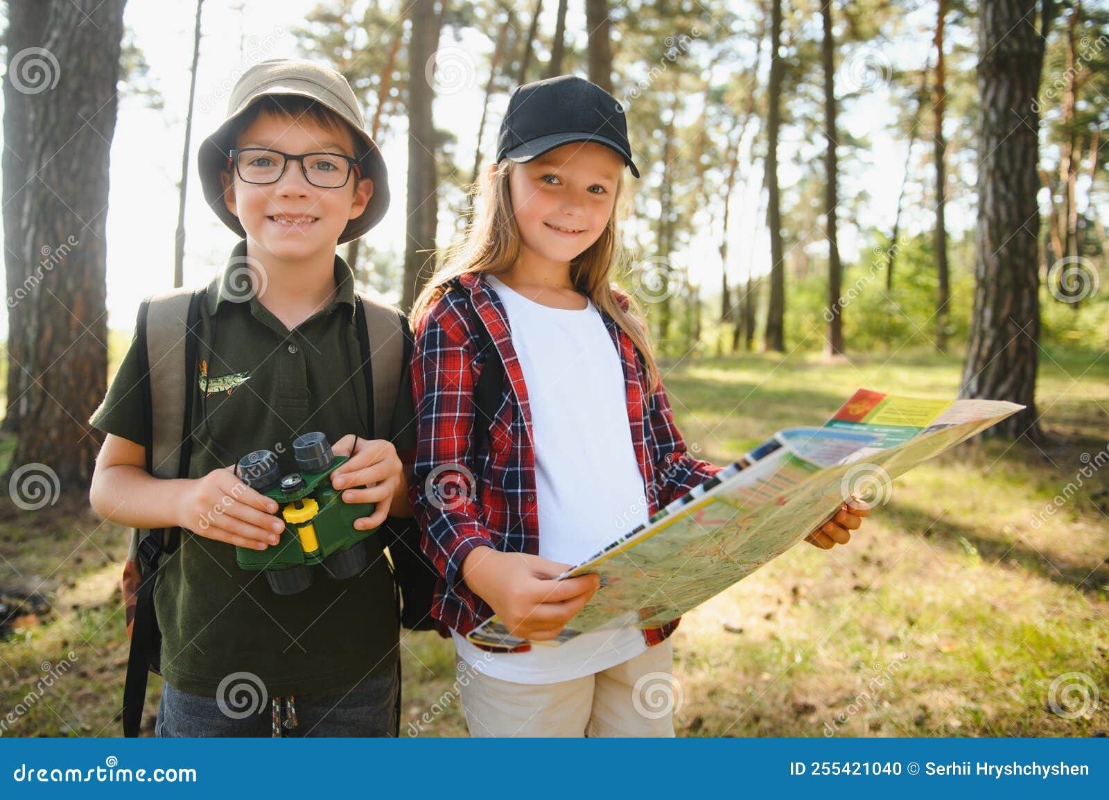 Kids scouts in the forest. stock photo. Image of group - 255421040