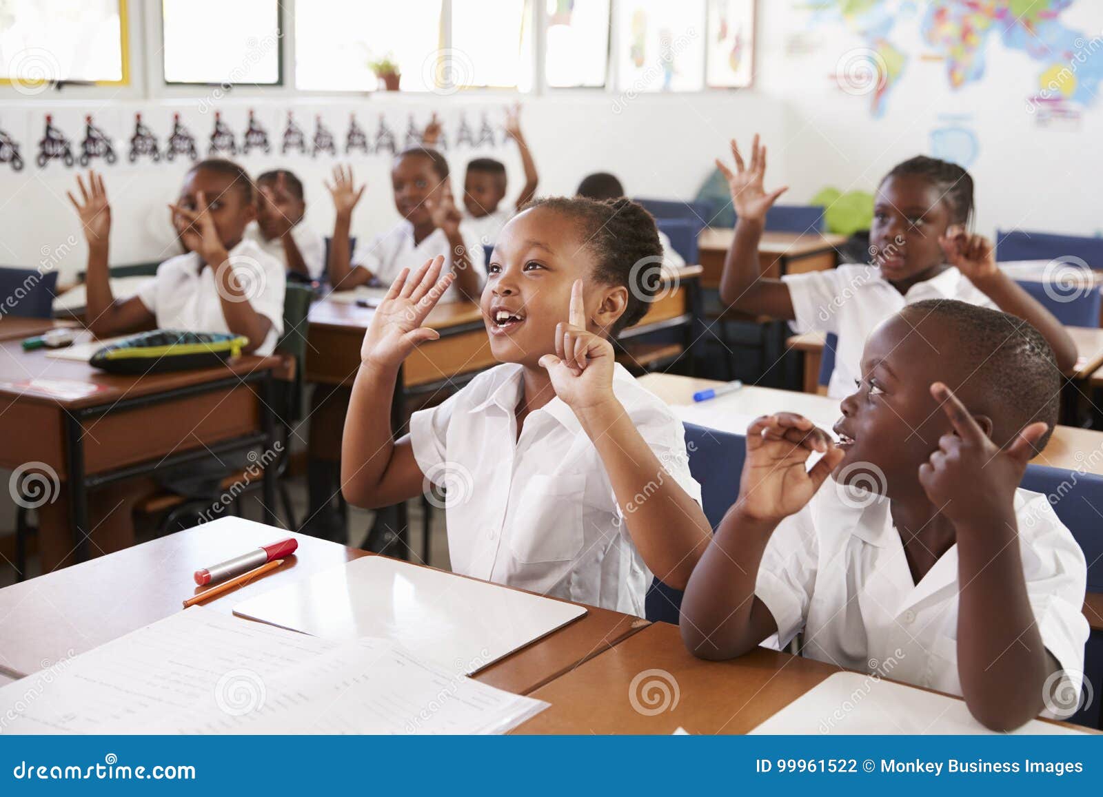 Kids Showing Hands during a Lesson at an Elementary School Stock Photo ...
