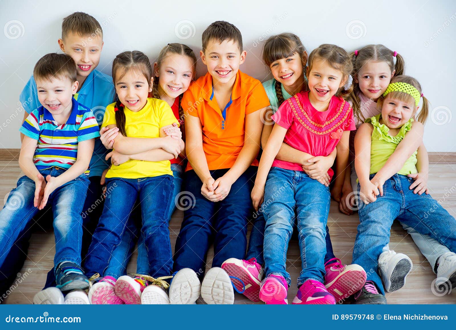 Kids sit together stock photo. Image of young, teacher - 89579748