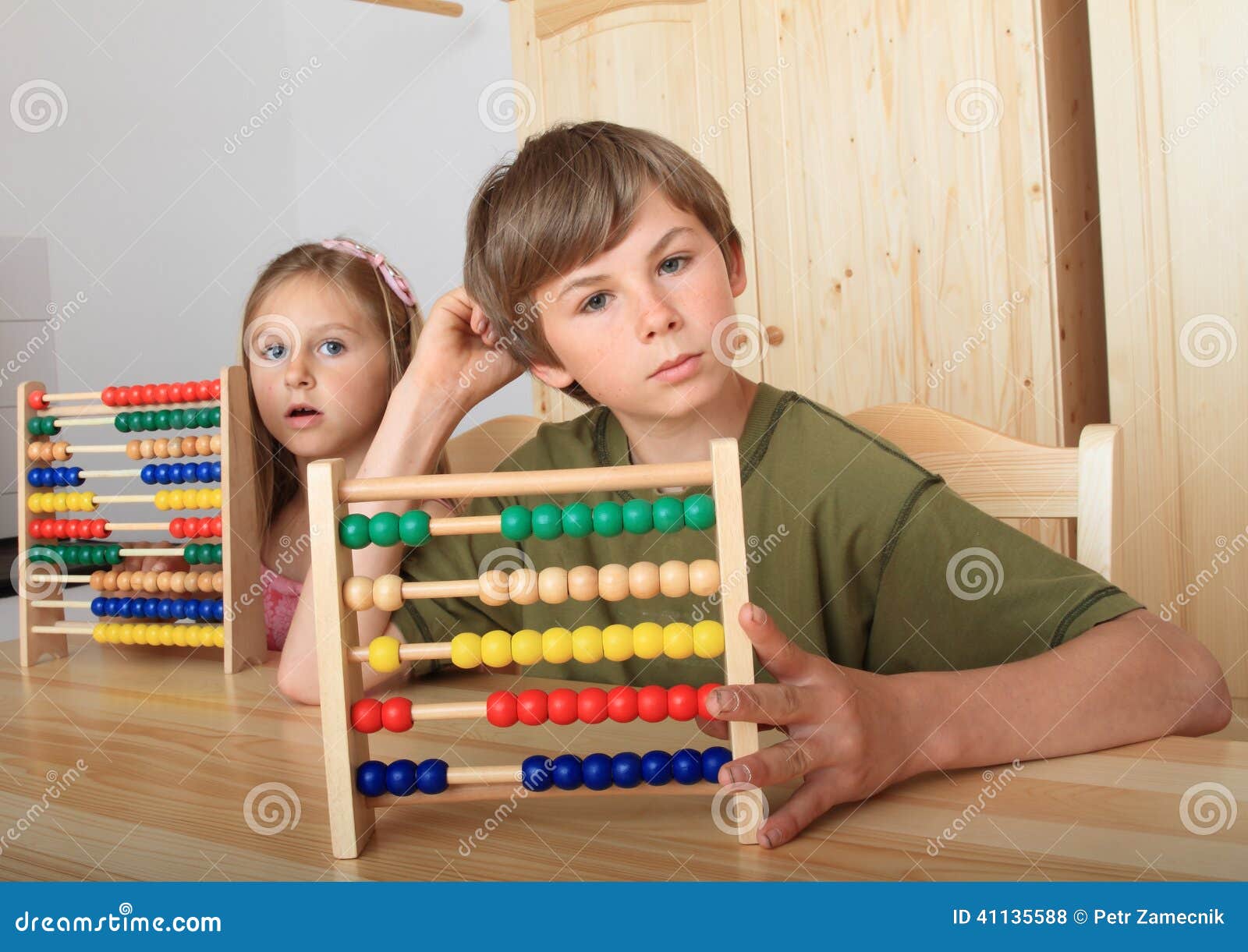 Kids Sitting Behind Wooden Table with Abacuses Stock Photo - Image of ... Kids Sitting Behind Wooden Table with Abacuses Stock Photo - Image of ...