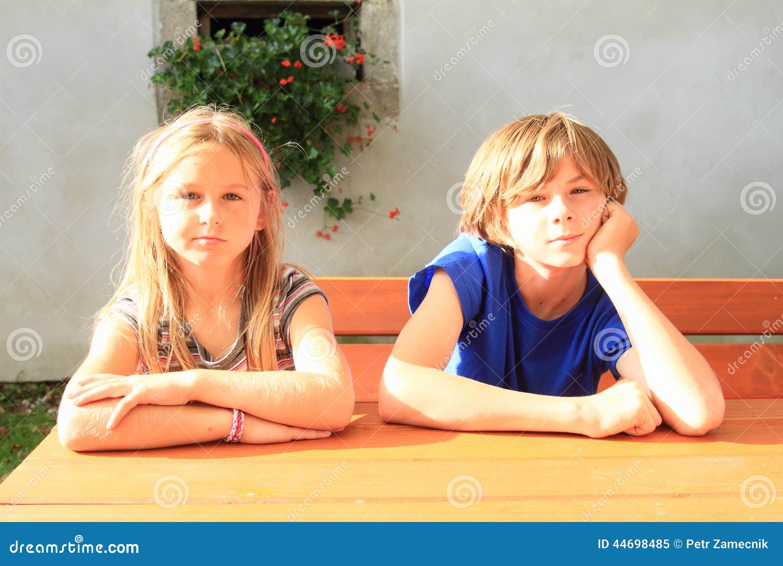 Kids Sitting Behind Wooden Table Stock Image - Image of kids, brother ... Kids Sitting Behind Wooden Table Stock Image - Image of kids, brother ...