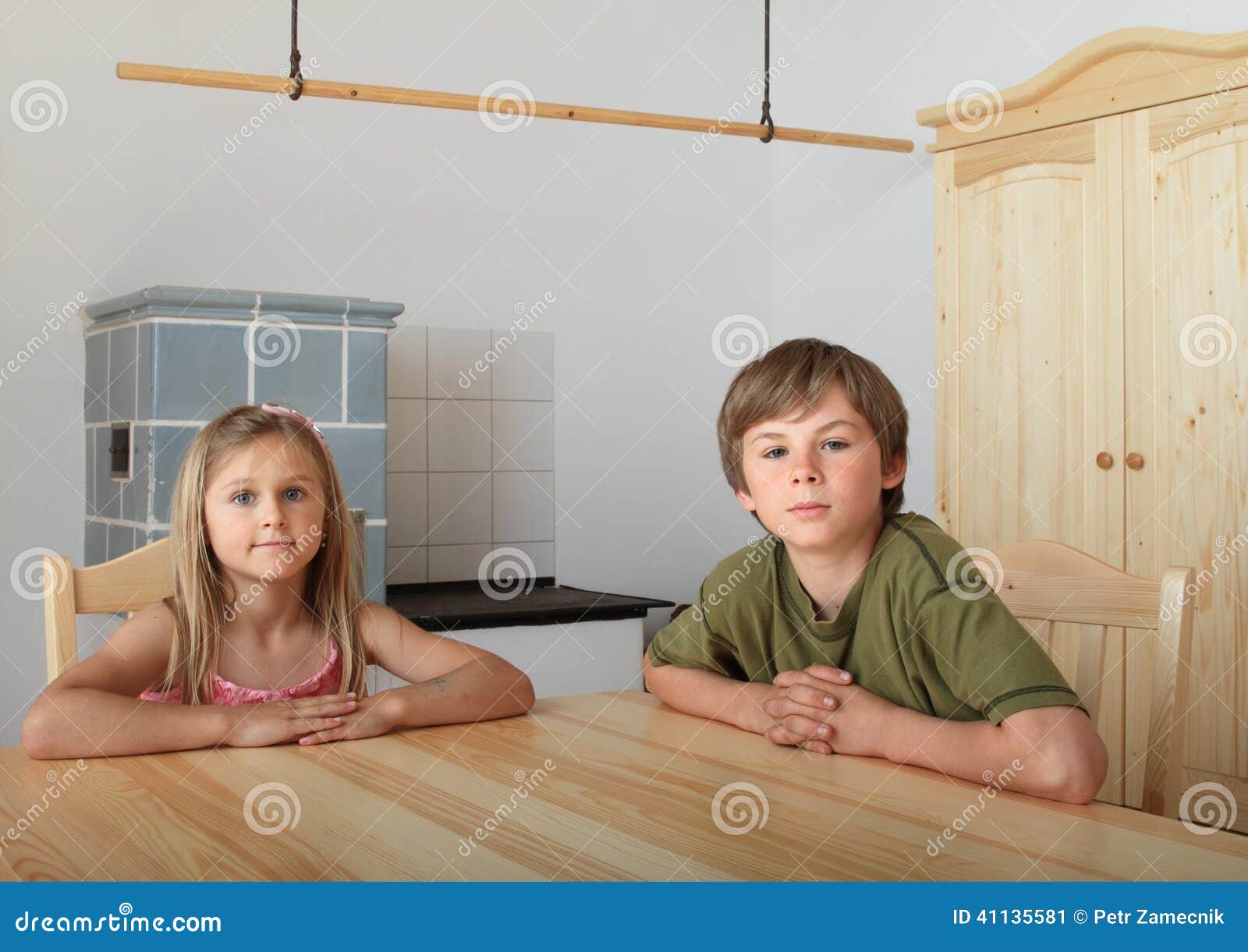 Kids Sitting Behind Wooden Table Stock Image - Image of sitting ... Kids Sitting Behind Wooden Table Stock Image - Image of sitting ...
