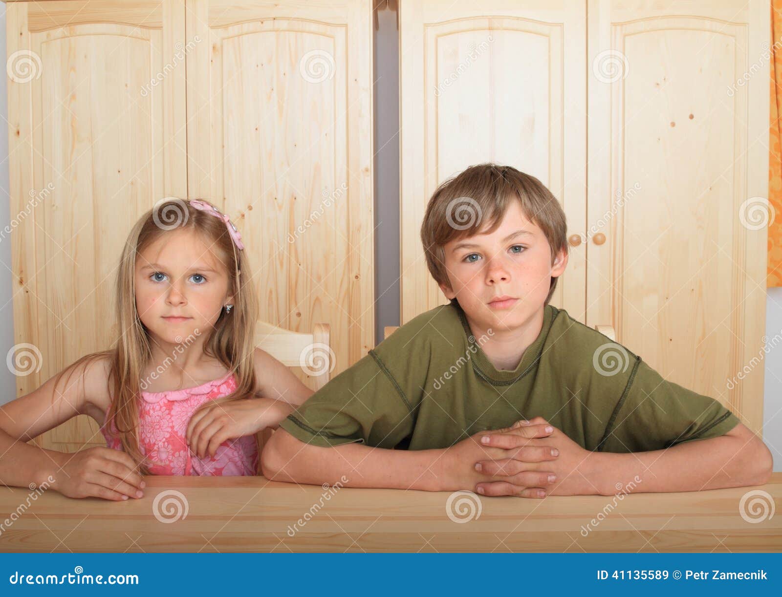 Kids Sitting Behind Wooden Table Stock Image - Image of children ... Kids Sitting Behind Wooden Table Stock Image - Image of children ...