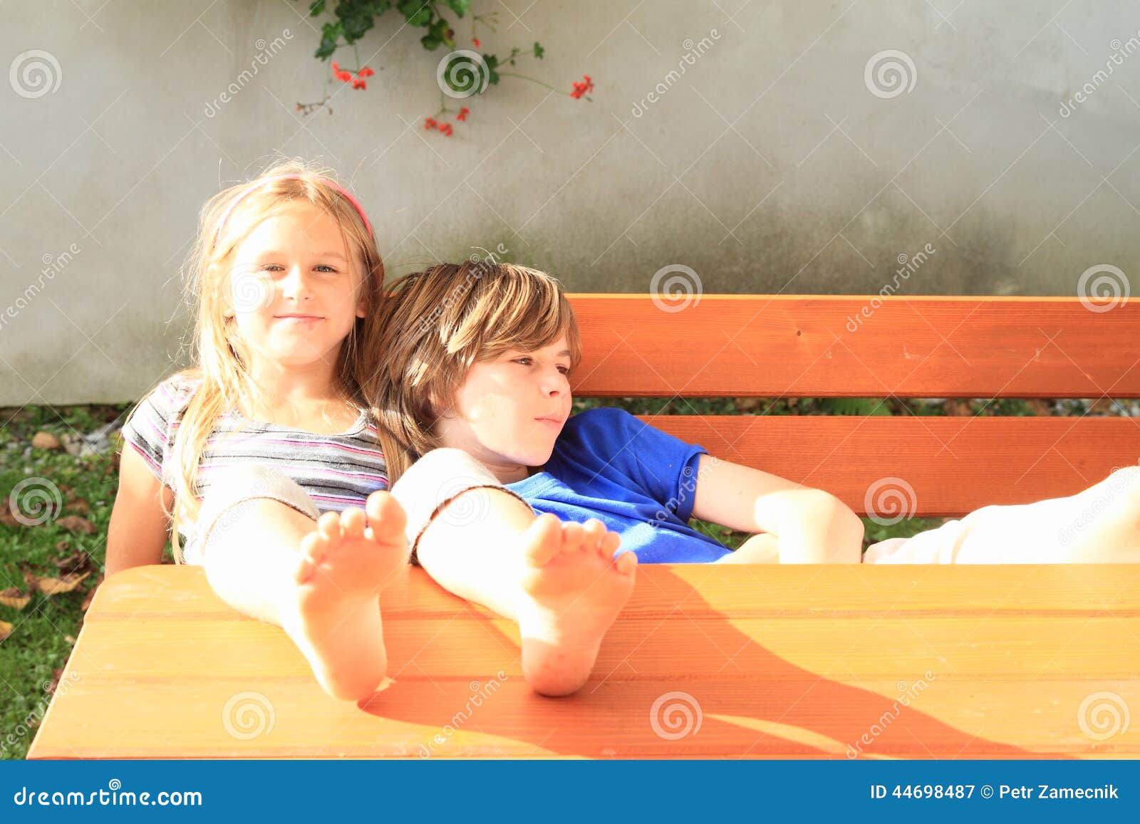 Kids Sitting Behind Wooden Table Stock Image - Image of friends ... Kids Sitting Behind Wooden Table Stock Image - Image of friends ...
