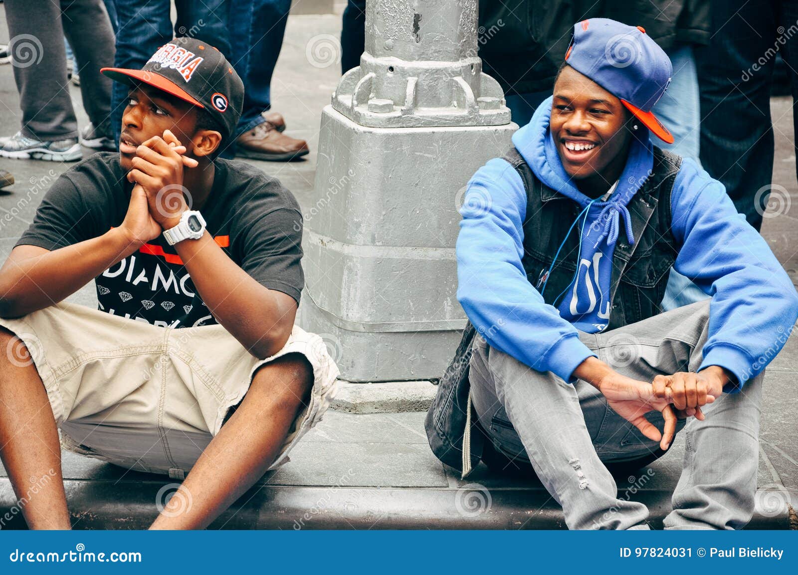 2 Kids Sitting in Times Square, Manhattan. Editorial Photo - Image of ...