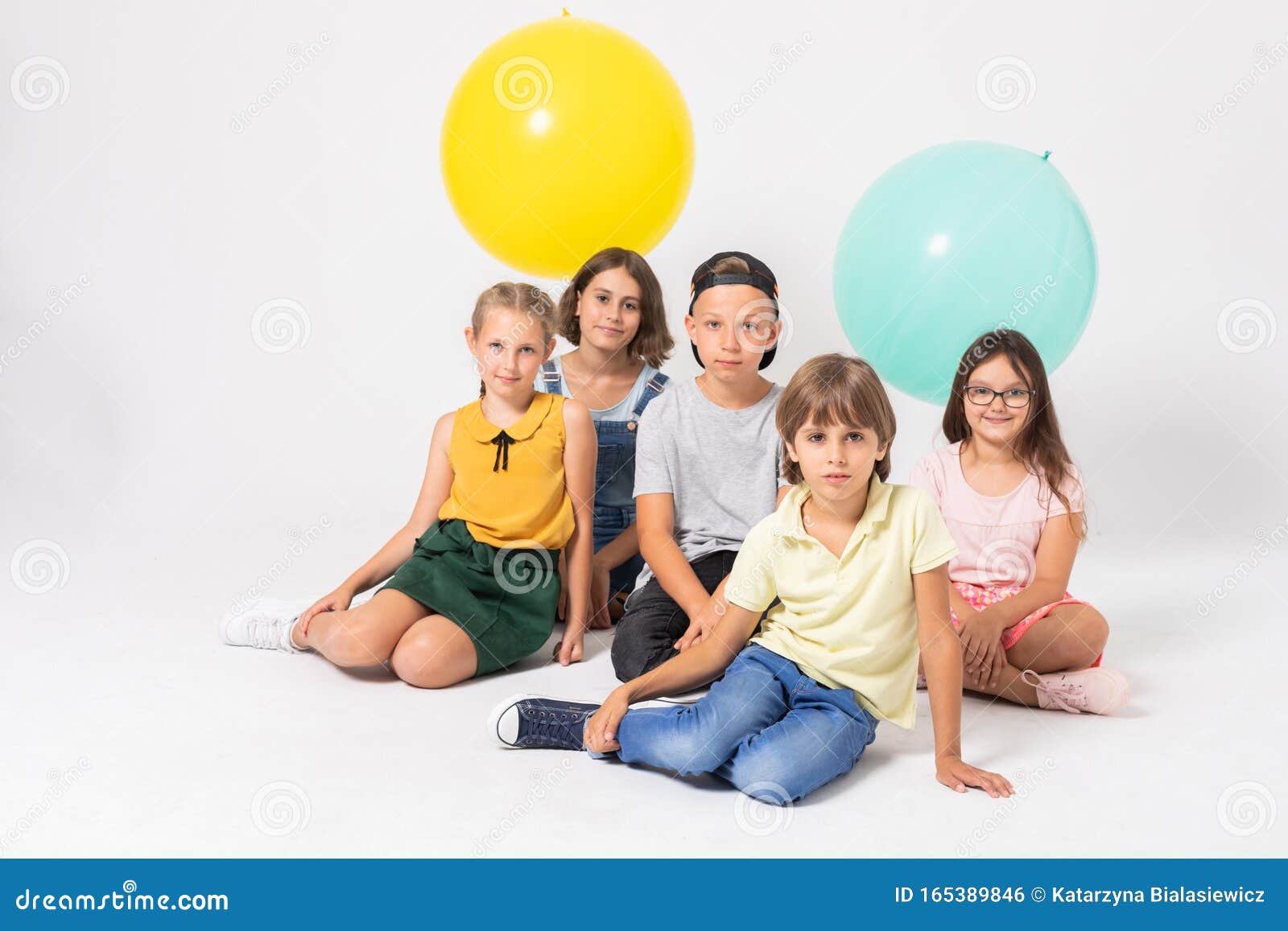 Kids sitting together stock photo. Image of children - 165389846
