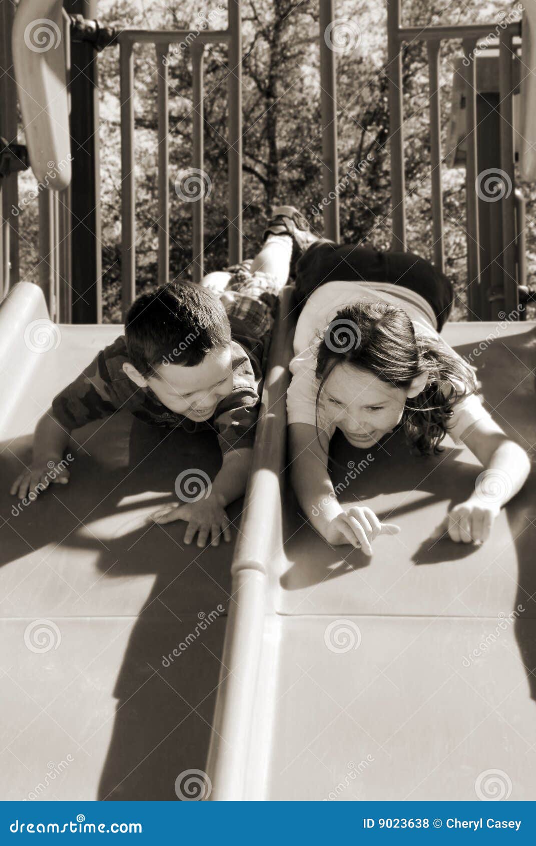 Kids on slide stock photo. Image of childhood, togetherness - 9023638