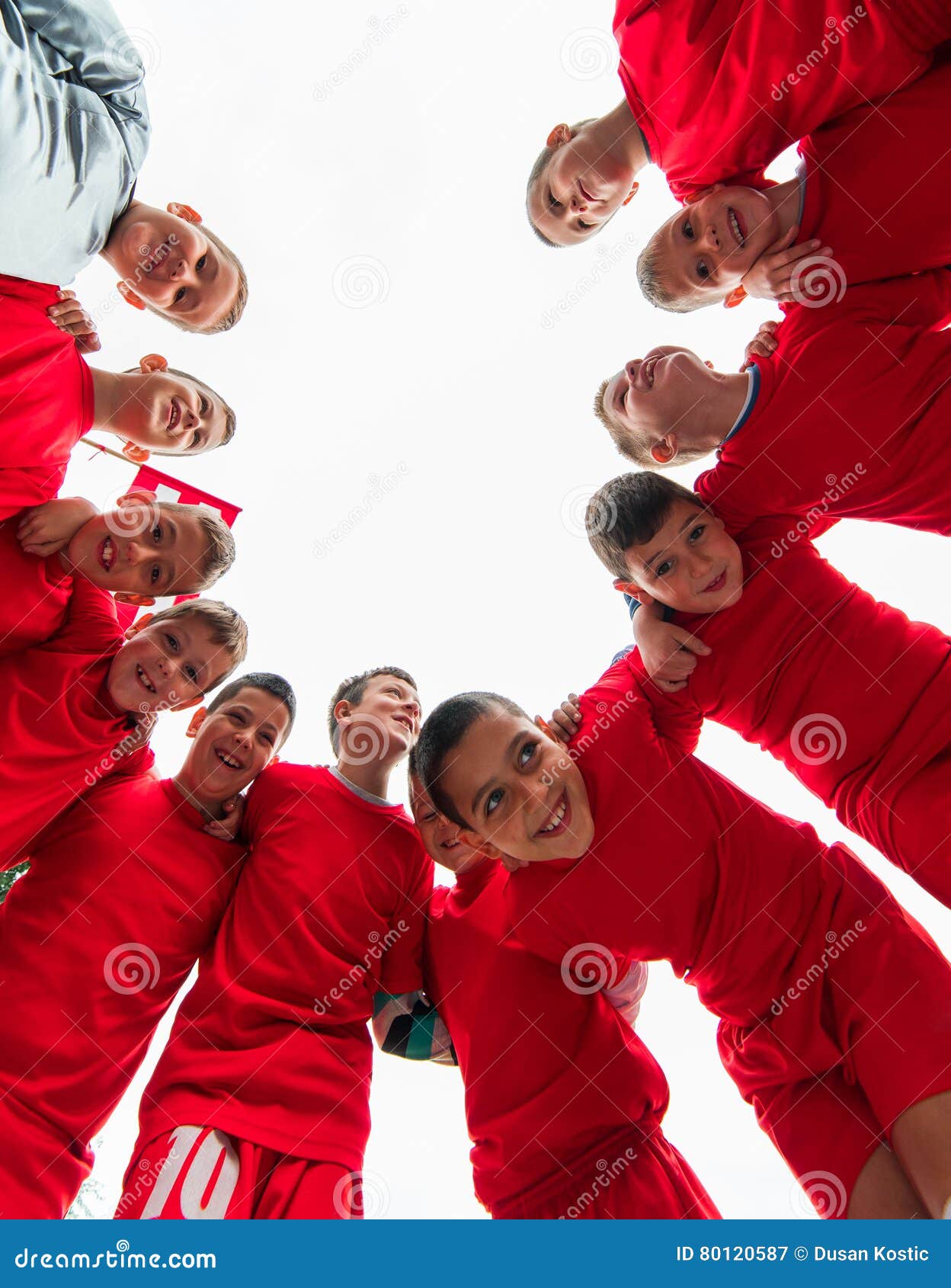 Kids soccer team in huddle stock image. Image of happiness - 80120587