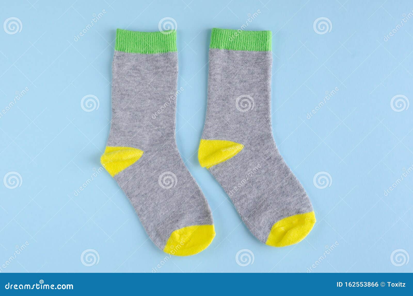 Kids Socks Composition on Blue Background. Flat Lay Stock Photo - Image ...