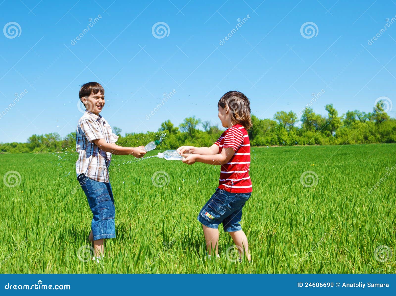 Kids spraying water stock image. Image of friend, leisure - 24606699