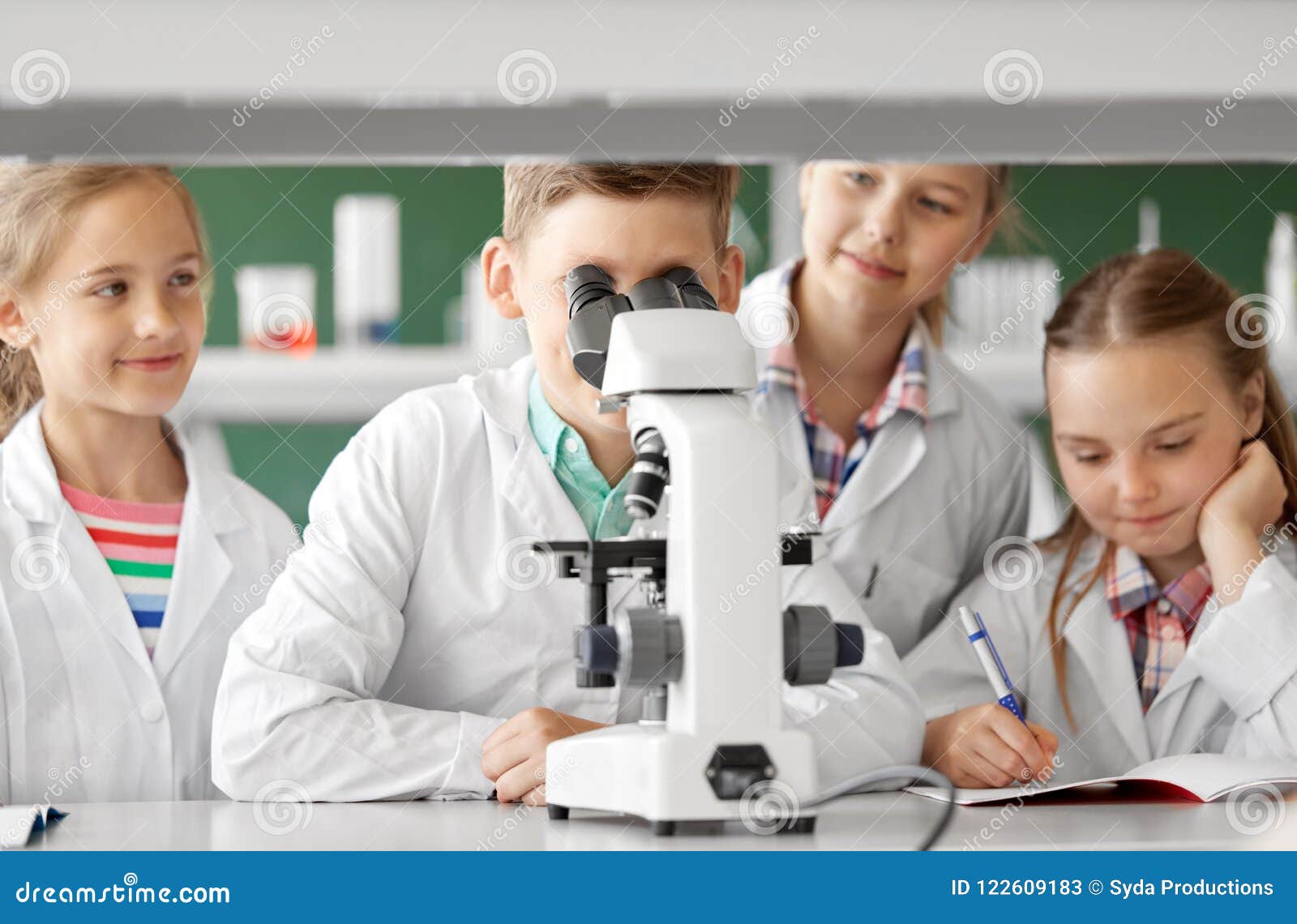 Kids or Students with Microscope Biology at School Stock Image - Image ...
