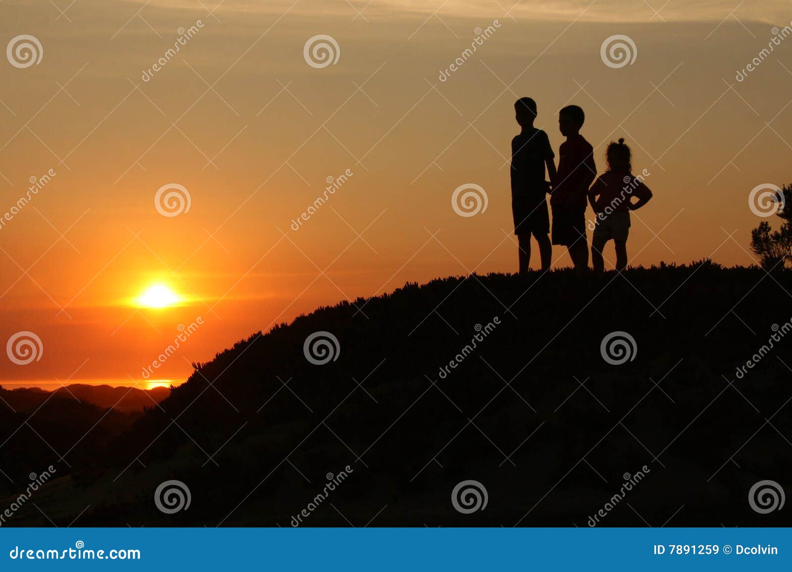 Kids at Sunset 2 stock image. Image of colors, evening - 7891259
