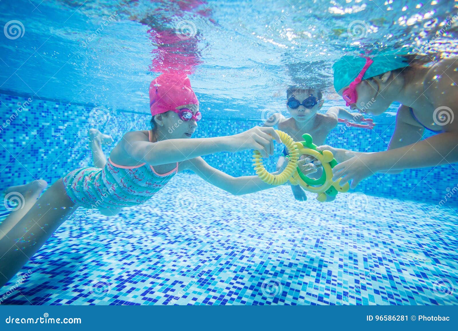 Kids Swimming Underwater and Playing with Toys Stock Image - Image of ...