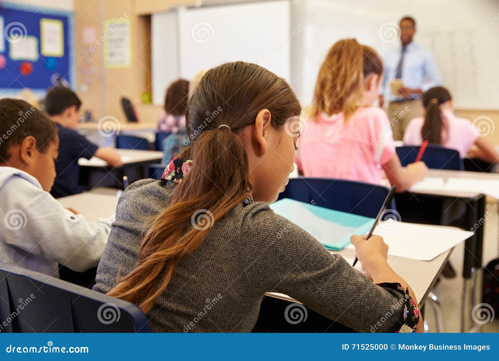 Students Taking Notes In Class