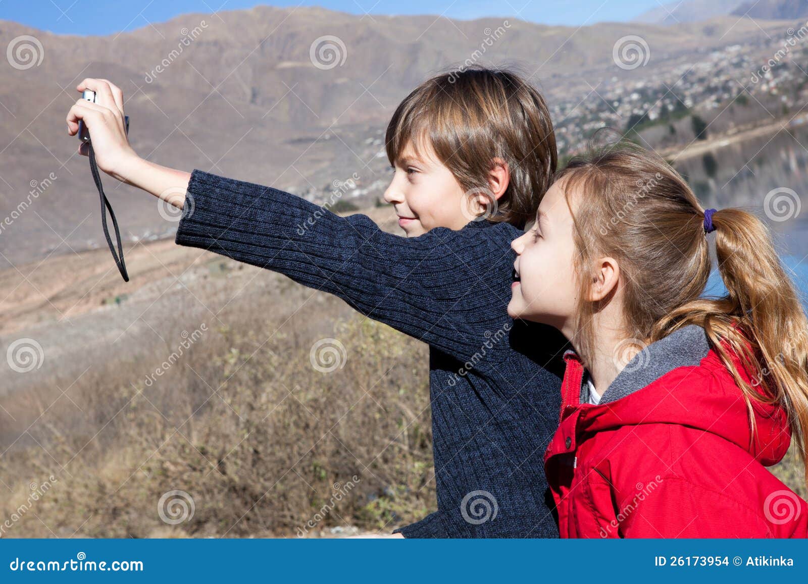 Two Cheerful Kids Taking Pictures Outdoors Stock Photo - Image of ...