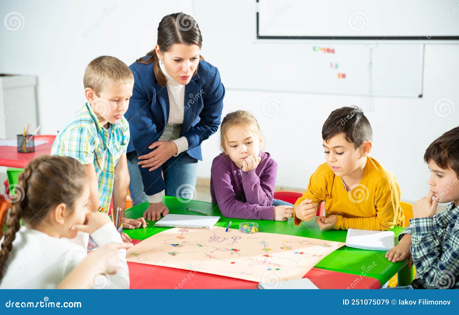 Kids with Teacher Playing Educational Tabletop Game Stock Image - Image ... Kids with Teacher Playing Educational Tabletop Game Stock Image - Image ...