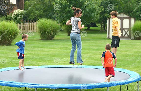 Kids on Trampoline stock photo. Image of kids, outdoor - 1244532