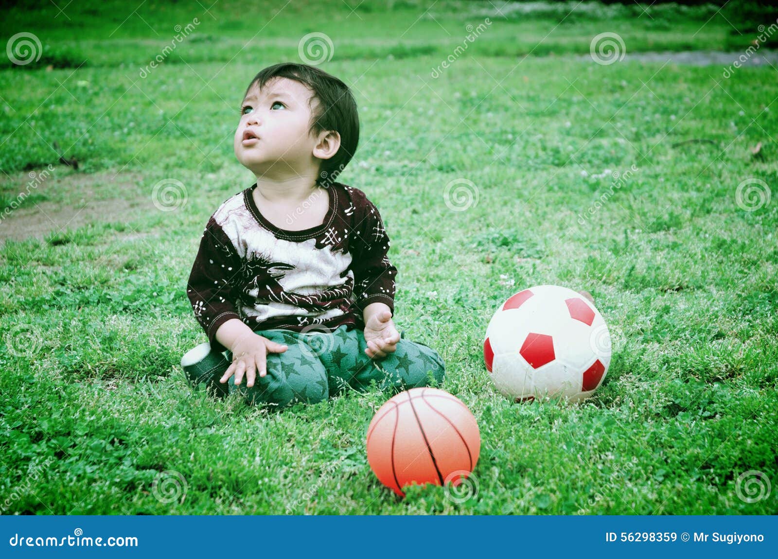 Kids with two balls stock image. Image of kids, balls - 56298359