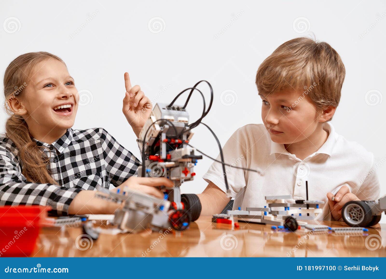 Kids using building kit. stock photo. Image of innovation - 181997100