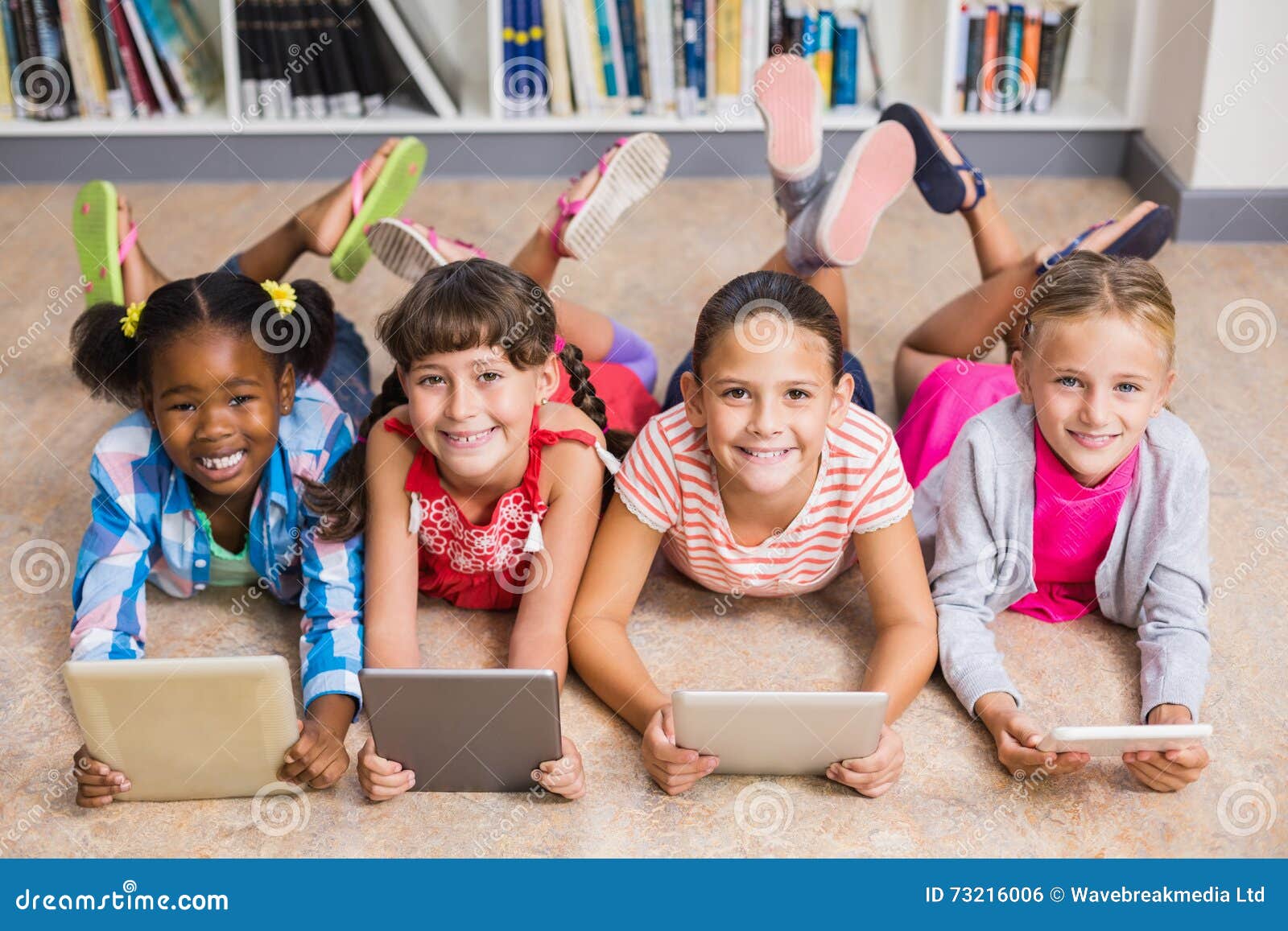Kids Using Digital Tablet in Library Stock Photo - Image of black ...