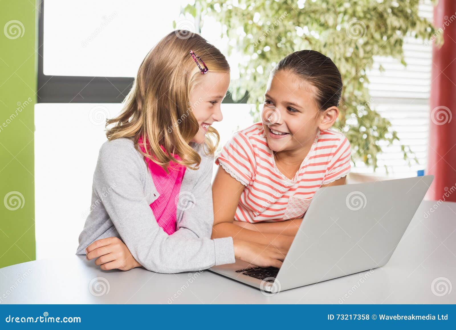 Kids Using Laptop in Library Stock Photo - Image of girl, internet ...