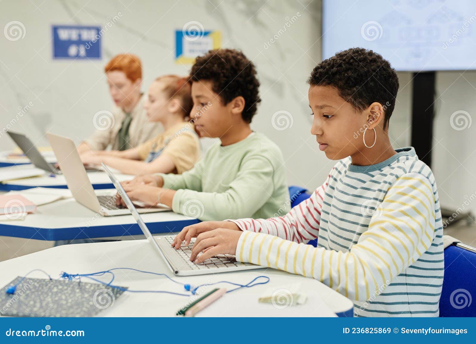 Kids Using Laptops in Row stock image. Image of creativity - 236825869