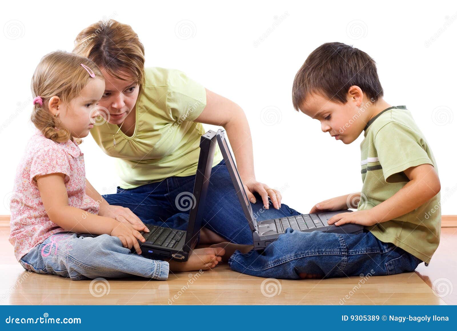 Kids Using Laptops Under Adult Supervision Stock Image - Image of ...