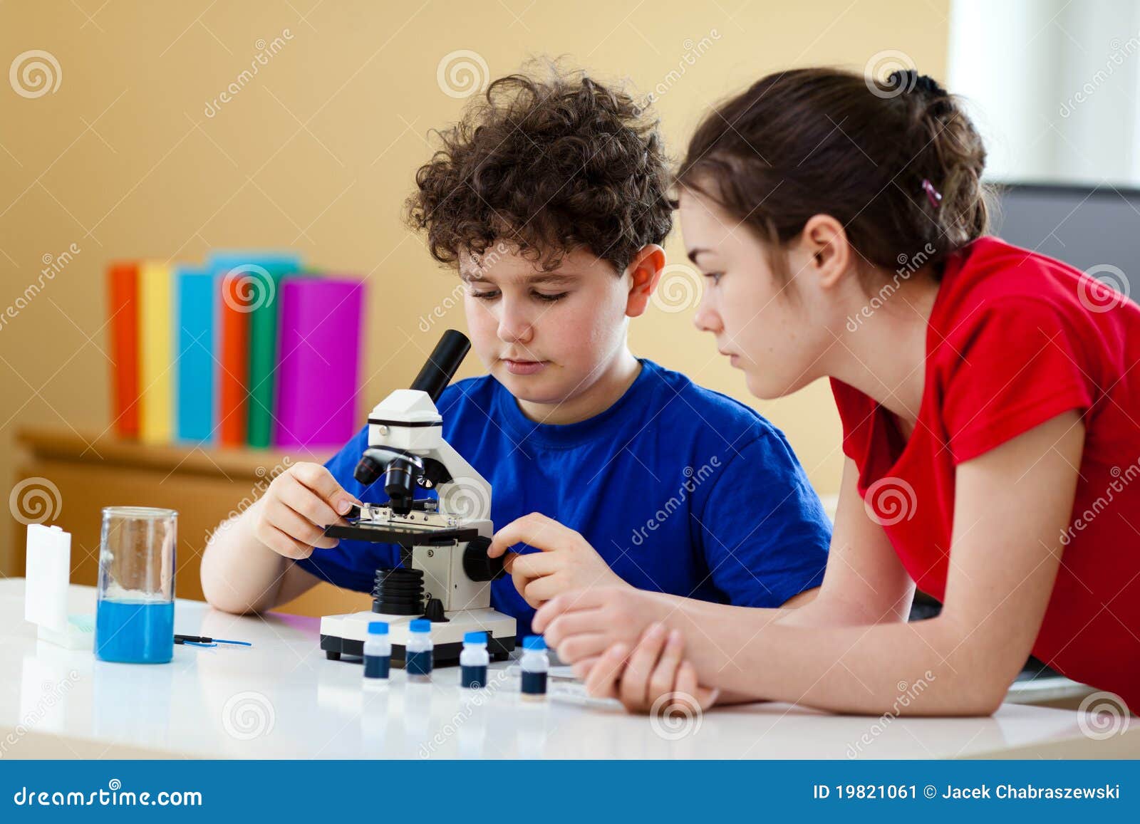 Kids using microscope stock image. Image of biology, close - 19821061