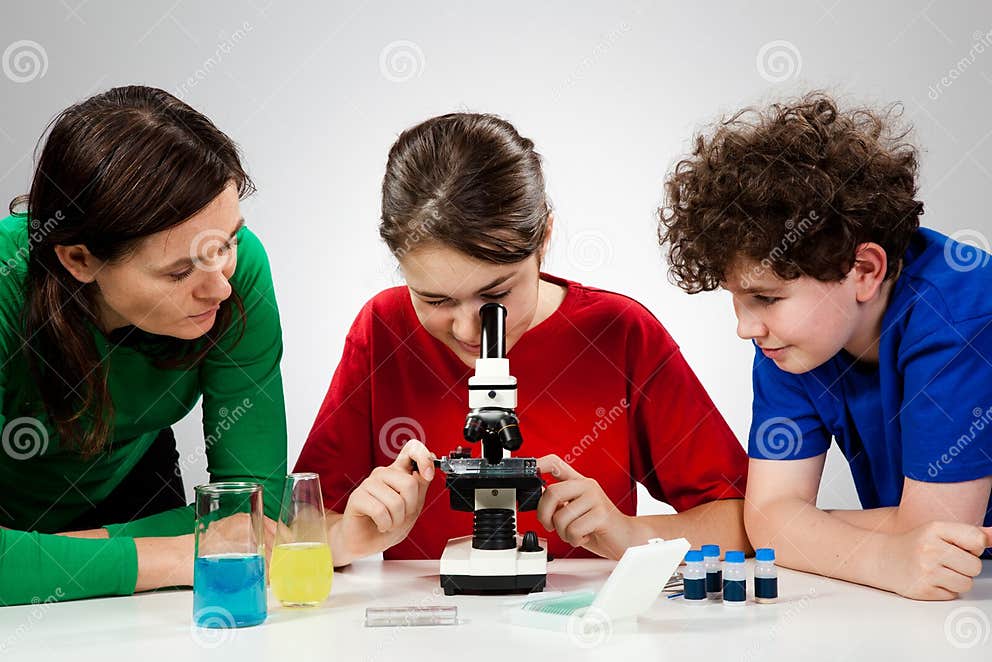 Kids using microscope stock image. Image of home, bacteria - 20263599