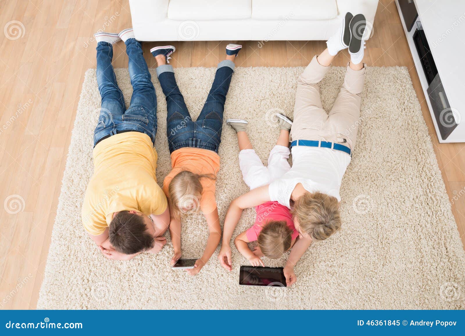 Kids Using Tablets Lying on Carpet Stock Image - Image of computers ...