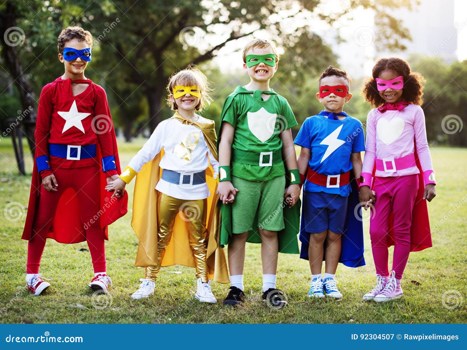 Boy In Superhero Costume And Helmet Sitting On Floor And Dreaming Of ...