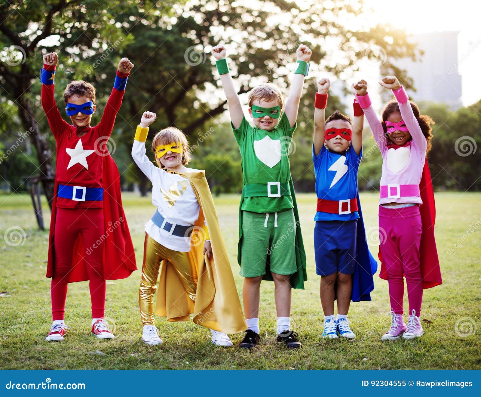 Boy In Superhero Costume And Helmet Sitting On Floor And Dreaming Of ...
